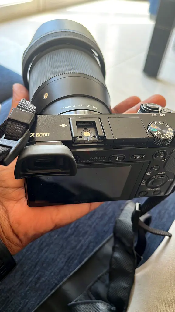 Sony alpha 6000 with sigma 16 mm f1.4 lens fixed price | dubizzle