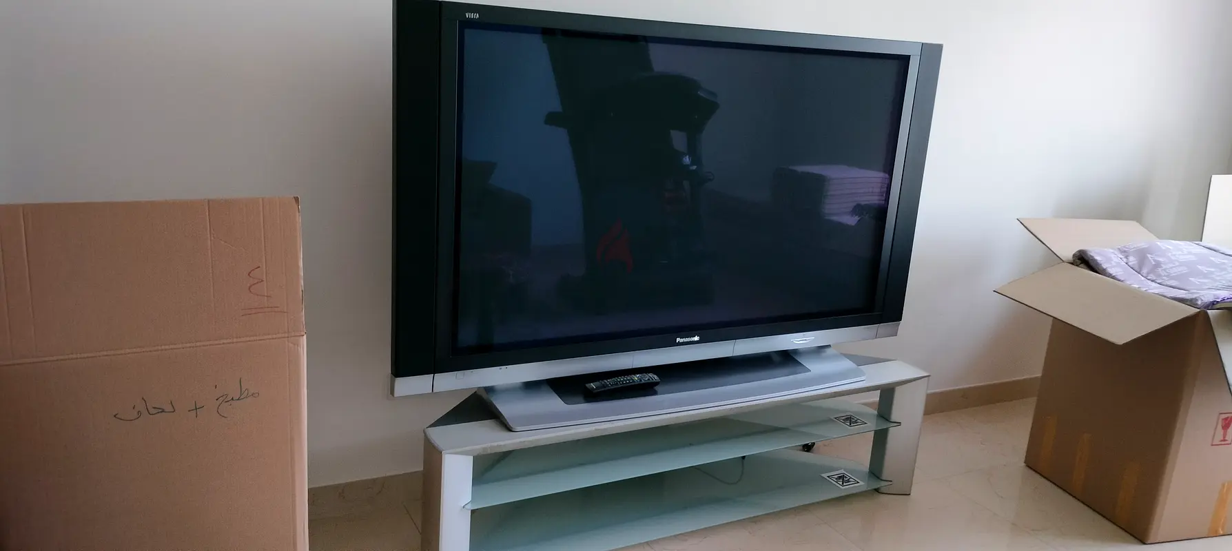 Panasonic Viera 65 inches High Definition Plasma with TV stand | dubizzle
