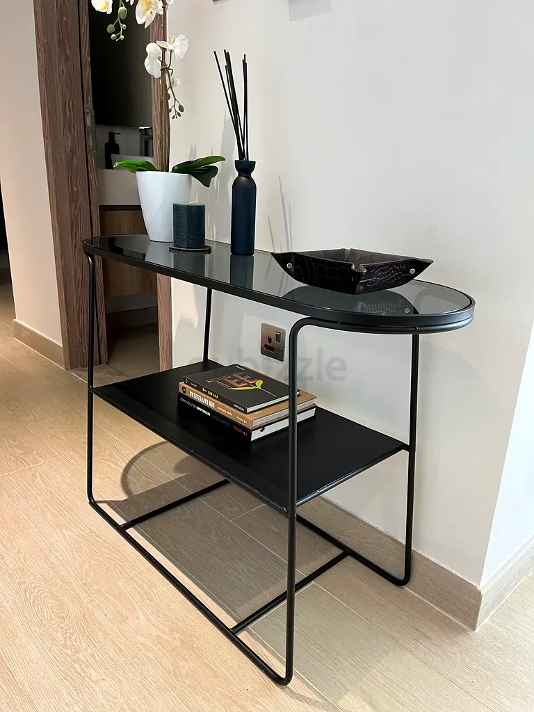Scandinavian-design console in black metal with glass top | dubizzle