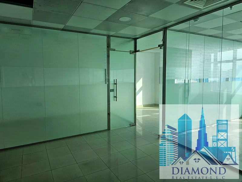 Office: office with glass partition for rent in Horizon Towers, Ajman ...