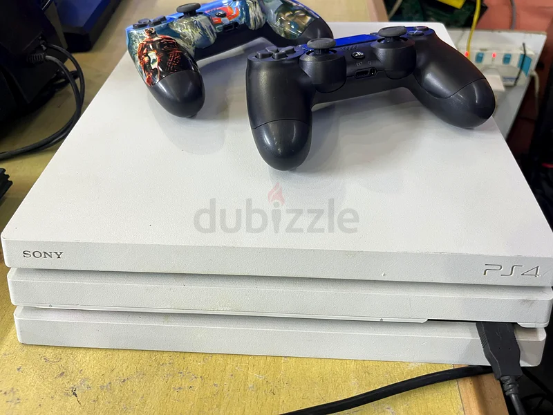 Modded PS4 Pro 1Tb with 33 games inside and 2 controller dubizzle