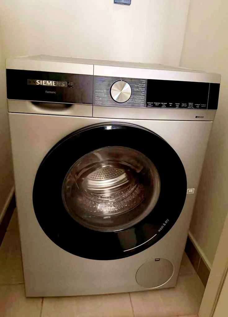 Siemens Washing Machine - 9+6kg Efficient and Sleek Design! | dubizzle