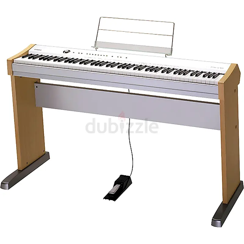 Casio PS20 Piano having 88 weighted keys. Wooden stand and sustain ...