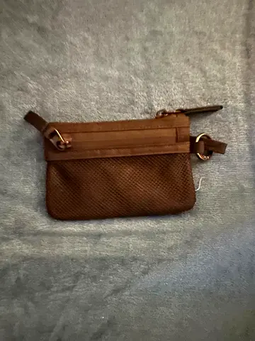 Classifieds: Small. Stylish Brown Pouch for Every Occasion | dubizzle Dubai