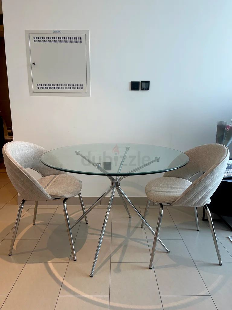 Stylish Glass Dining Table with Comfortable Chairs | dubizzle Dubai