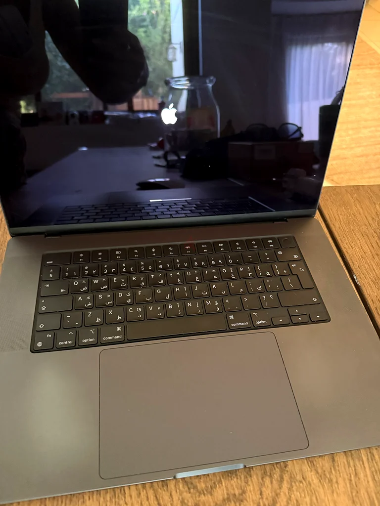 16 inch Mac book pro only used 6 months comes with charger and mouse ...