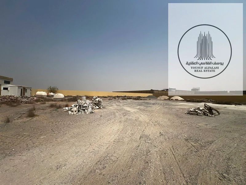 Commercial Plot: A fenced plot of land on a main street, 60 thousand ...