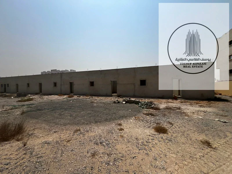 Commercial Plot: A fenced plot of land on a main street, 60 thousand ...