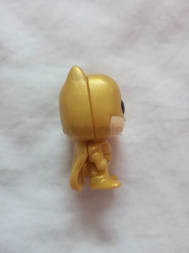 Rare golden batman from kinder joy Dc funko price negotiable | dubizzle