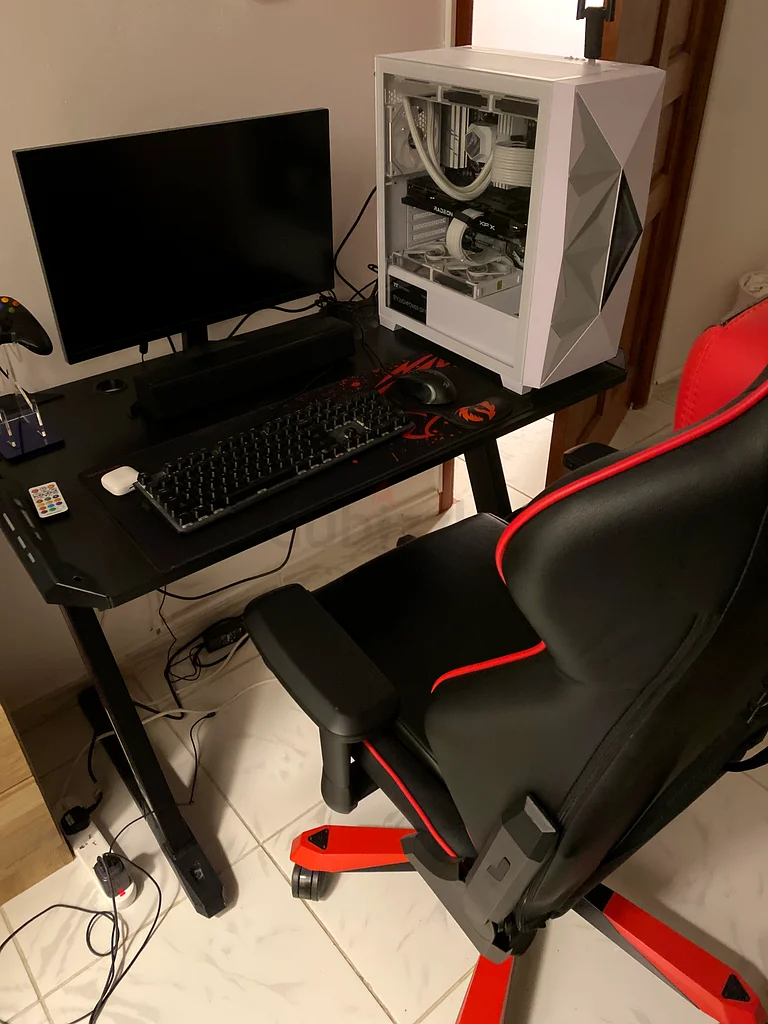 Gaming Setup: High-Performance Computer and Stylish Gaming Chair for ...