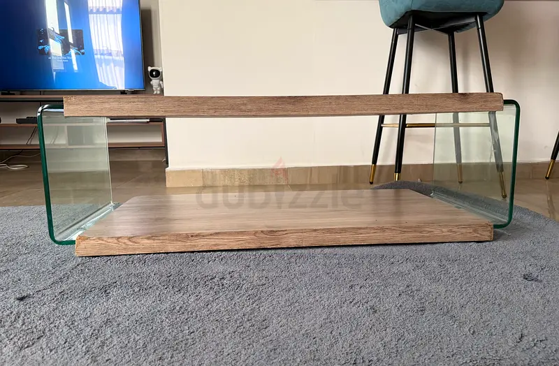 100 aed Stylish Wooden Coffee Table with Glass Accents | dubizzle Dubai