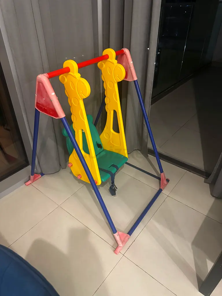 Colorful Baby Swing for Outdoor Fun | dubizzle Dubai