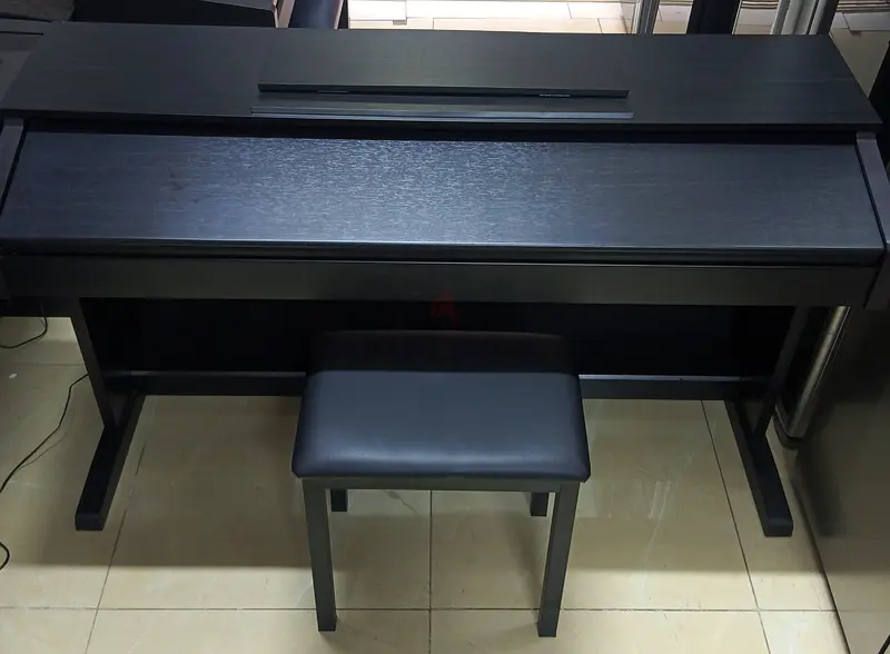 The Roland RP30 is a digital piano with 88 weighted keys and graded ...