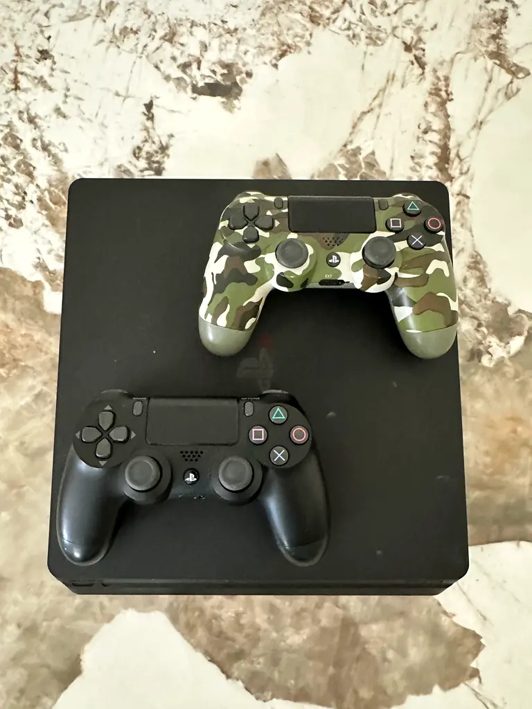 PlayStation 4 Console with Controllers - Great Condition! | dubizzle Dubai