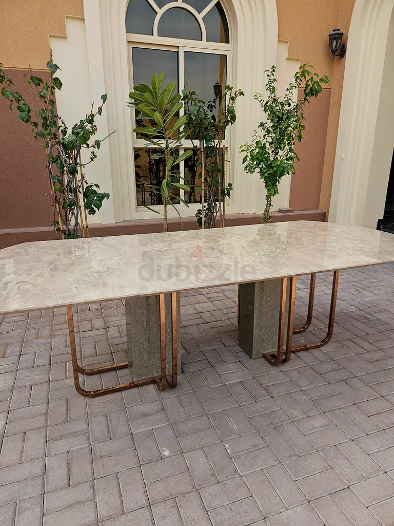 Elegant Modern Dining Table with Unique Base | dubizzle Dubai