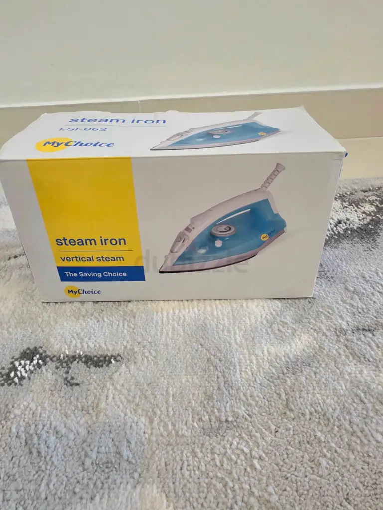 Steam Iron for Effortless Wrinkle Removal | dubizzle Abu Dhabi