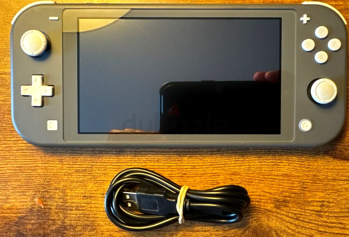 Nintendo Switch Lite + 1 Game - Sharjah | dubizzle Sharjah