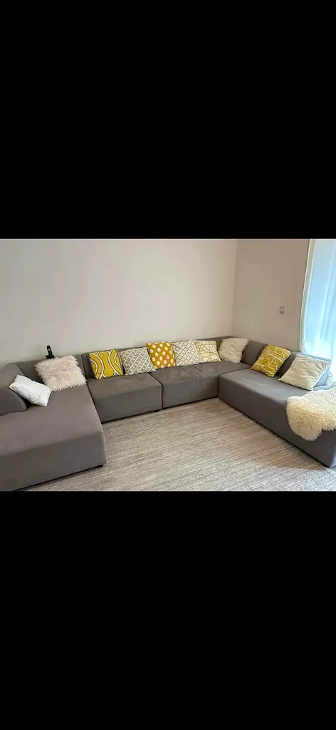 Spacious L-Shaped Sofa with Cozy Cushions | dubizzle Abu Dhabi