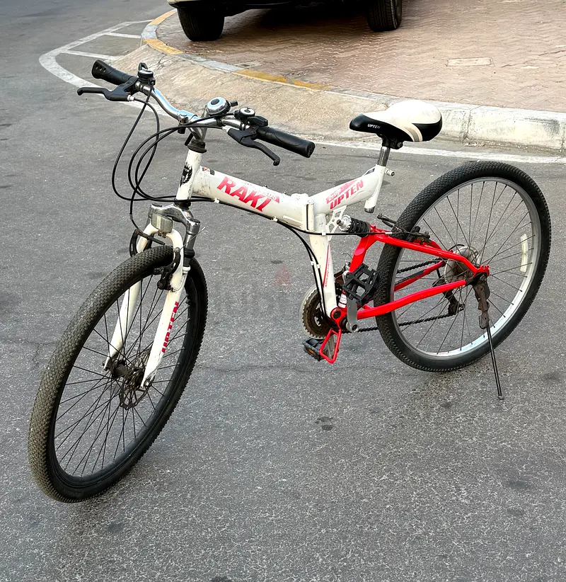 Reliable Red and White Mountain Bike for Sale | dubizzle Abu Dhabi