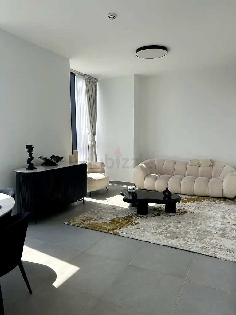 Elegant Modern Living Room Set with Cozy Sofa and Rug | dubizzle Sharjah