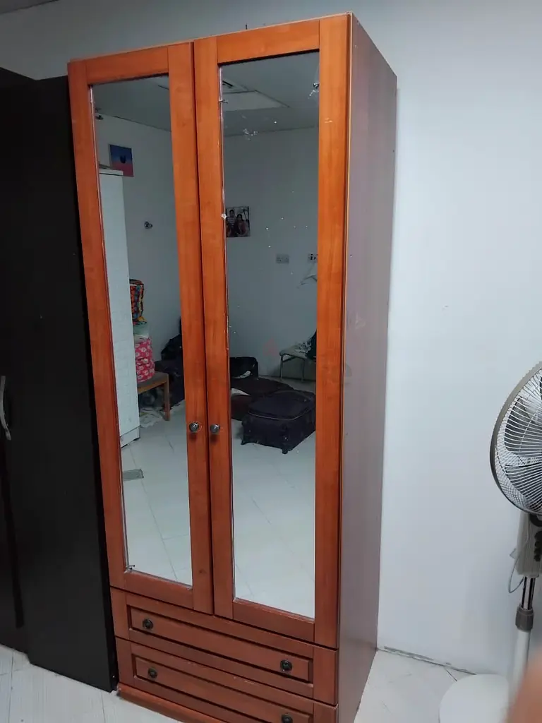 Elegant Wooden Wardrobe with Mirror and Ample Storage | dubizzle Abu Dhabi