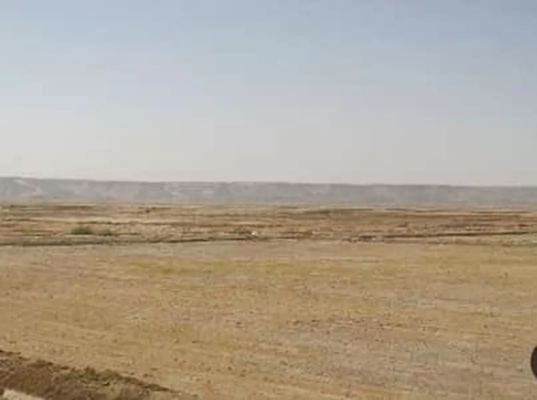 Land: For sale: a fenced area in Al Sajaa Industrial Area, inside the ...