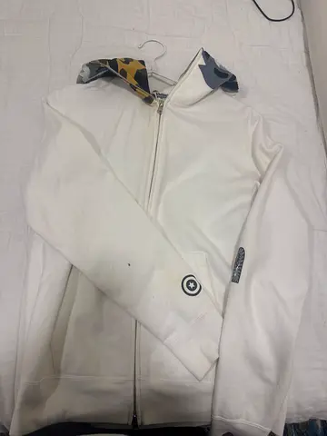 Classifieds: White zip-up hoodie with patterned hood lining, size ...
