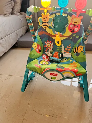 Classifieds: Used baby bouncer/rocker chair with toy bar - good ...