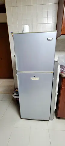 Classifieds: Used double-door refrigerator with top freezer - good ...