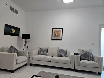 Classifieds: White and light grey 5- seater sofa with contrasting ...
