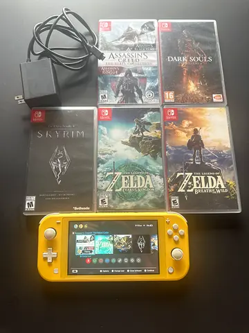 Classifieds: Yellow Nintendo Switch Lite with 6 Games (Zelda, Skyrim ...