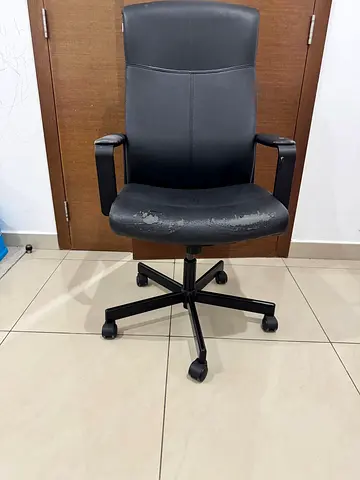 Classifieds: Used black office swivel chair with armrests - worn seat ...