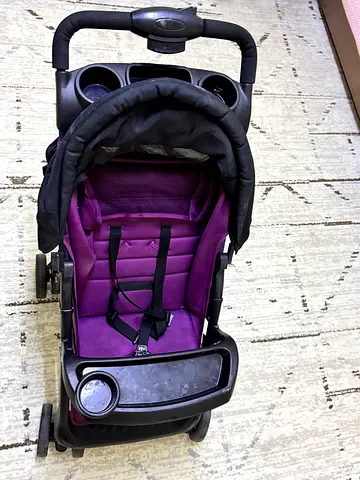 Classifieds: Purple baby stroller with child tray for food and cup ...