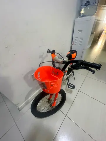 Classifieds: Orange and White Kids Bicycle with Front Basket | dubizzle ...
