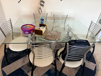 Classifieds: Glass Top Dining Table with 6 Metal Chairs - Good ...