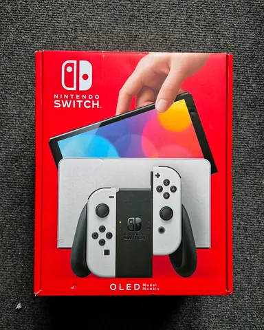Classifieds: Nintendo Switch OLED (White) - Boxed, new with 2 games ...