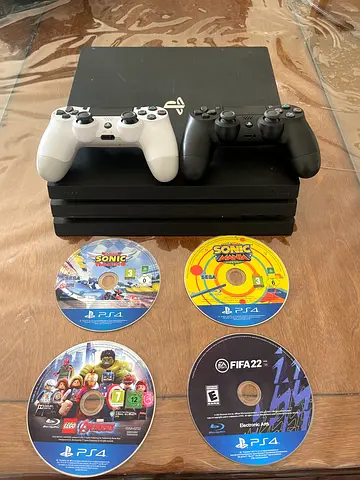 Classifieds: Sony PS4 Pro with 2 DualShock Controllers and 4 Games ...
