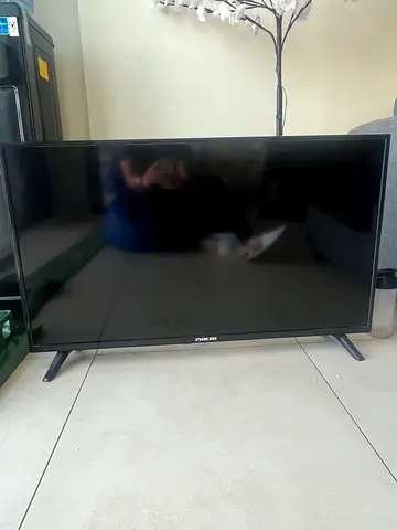 Classifieds: Nikai LED Flat Screen TV with Stand | dubizzle Abu Dhabi