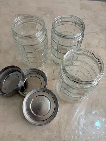 Classifieds: Set of 4 Glass Storage Jars with Metal Lids | dubizzle Abu ...
