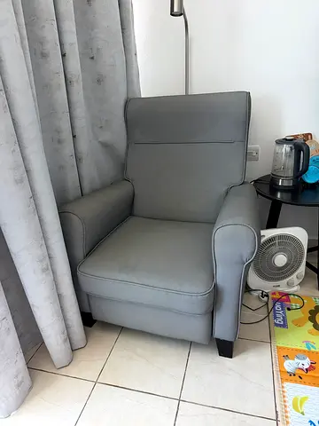 Classifieds: Light grey upholstered armchair in good condition ...