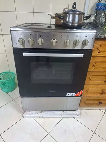 Classifieds: Used freestanding Midea electric oven with stovetop - good ...
