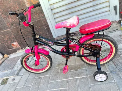 Classifieds: Childrens pink and black training bike with stabilizers ...