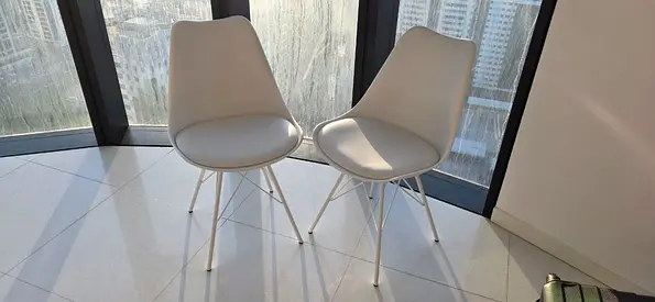 Classifieds: Pair of modern white dining chairs with metal legs - used ...