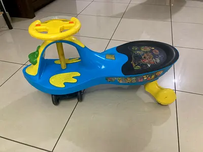 Classifieds: Blue and yellow ride-on wiggle car for kids | dubizzle Sharjah
