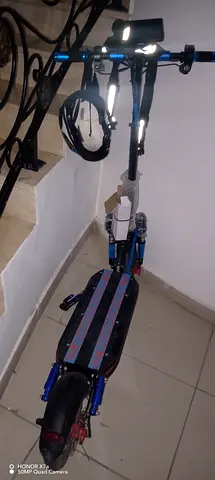 Classifieds: Used Adult Electric Scooter with Dual Deck and Suspension ...
