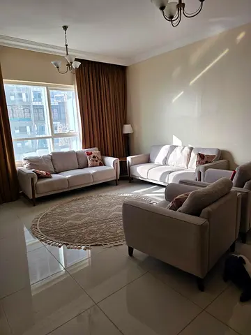 Classifieds: Light beige 3-piece sofa set with round patterned rug ...