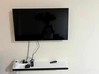 Classifieds: 42 inch wall-mounted LED TV with shelf and remotes ...