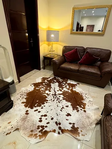 Classifieds: Genuine Brown White Cowhide Rug | dubizzle Dubai