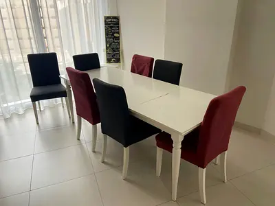Classifieds: White Extendable Dining Table with 7 Upholstered Chairs ...