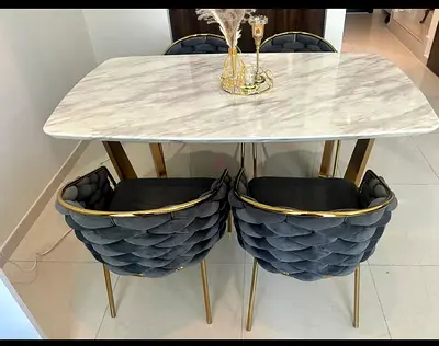 Classifieds: Marble-top dining table with 4 grey velvet woven chairs ...